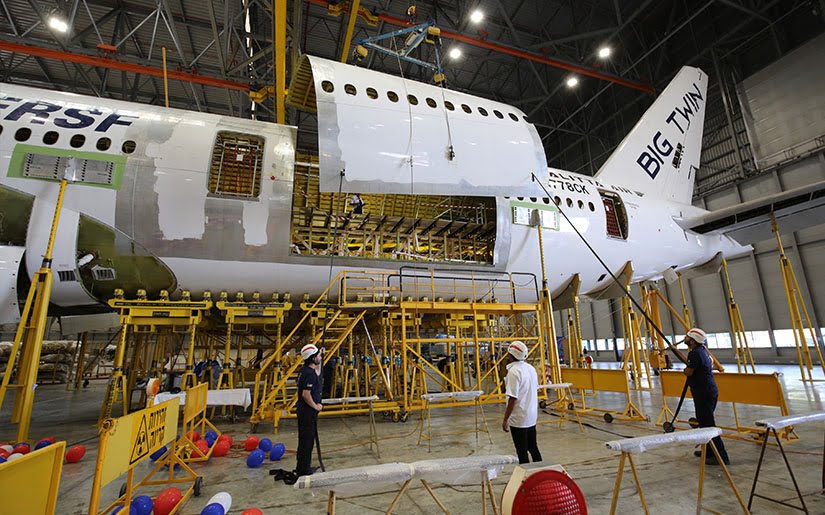 Adapting to a new economy and recycling passenger planes into cargo jets